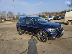 Blue Volkswagen Tiguan 2020 in Panevezys, with an engine capacity of 2.00 L and mileage of 162 thousand km for 18900 €, photo 4 on AUTOMOTO.COM.LV