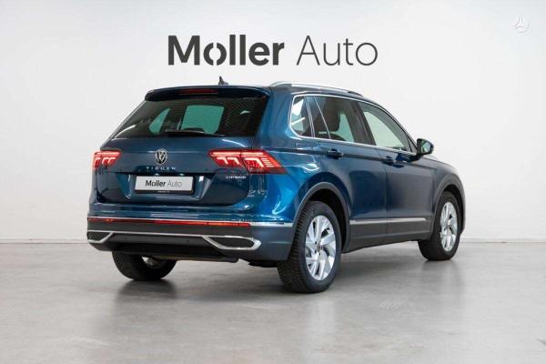 Blue Volkswagen Tiguan 2021 in Vilnius, with an engine capacity of 1.40 L and mileage of 135 thousand km for 23990 €, photo 3 on AUTOMOTO.COM.LV
