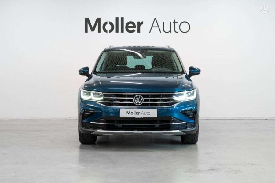 Blue Volkswagen Tiguan 2021 in Vilnius, with an engine capacity of 1.40 L and mileage of 135 thousand km for 23990 €, photo 5 on AUTOMOTO.COM.LV