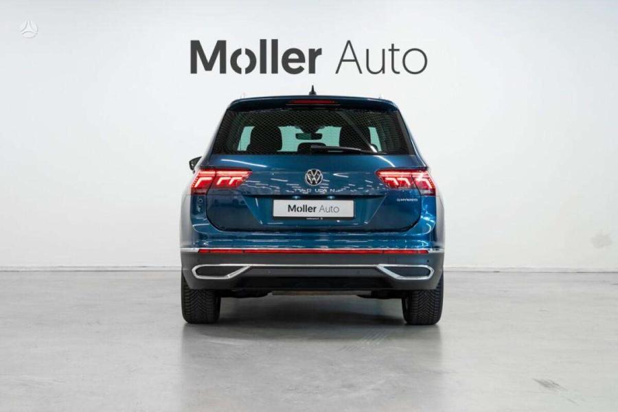 Blue Volkswagen Tiguan 2021 in Vilnius, with an engine capacity of 1.40 L and mileage of 135 thousand km for 23990 €, photo 6 on AUTOMOTO.COM.LV