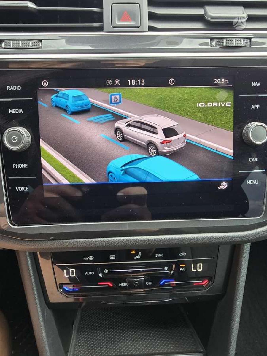 Blue Volkswagen Tiguan 2021 in Sirvintos, with an engine capacity of 1.97 L and mileage of 280 thousand km for 18700 €, photo 13 on AUTOMOTO.COM.LV