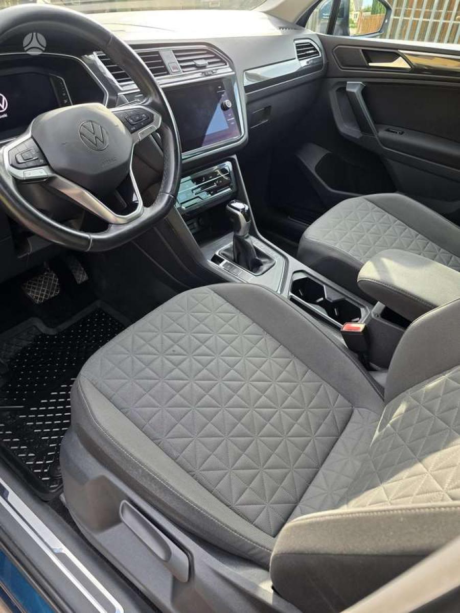 Blue Volkswagen Tiguan 2021 in Sirvintos, with an engine capacity of 1.97 L and mileage of 280 thousand km for 18700 €, photo 18 on AUTOMOTO.COM.LV