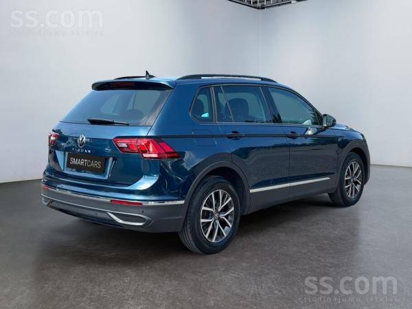 Blue Volkswagen Tiguan 2021 in Riga, with an engine capacity of 1.50 L and mileage of 87 thousand km for 21370 €, photo 5 on AUTOMOTO.COM.LV
