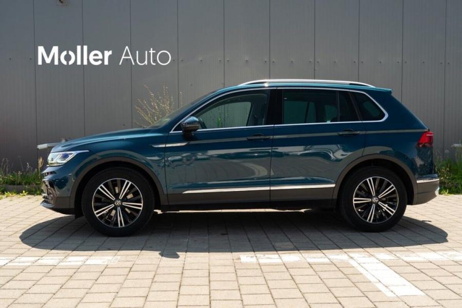 Blue Volkswagen Tiguan 2021 in Vilnius, with an engine capacity of 2.00 L and mileage of 102 thousand km for 25300 €, photo 4 on AUTOMOTO.COM.LV