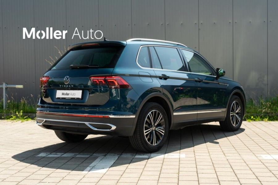 Blue Volkswagen Tiguan 2021 in Vilnius, with an engine capacity of 2.00 L and mileage of 102 thousand km for 25300 €, photo 7 on AUTOMOTO.COM.LV