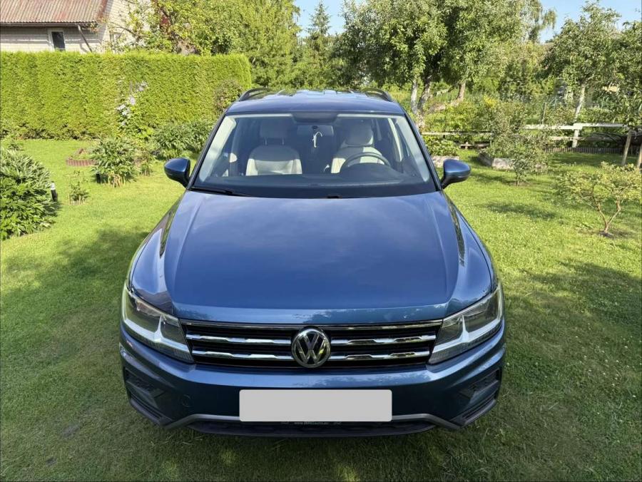 Blue Volkswagen Tiguan 2021 in Vilnius, with an engine capacity of 1.98 L and mileage of 93 thousand km for 14000 €, photo 1 on AUTOMOTO.COM.LV