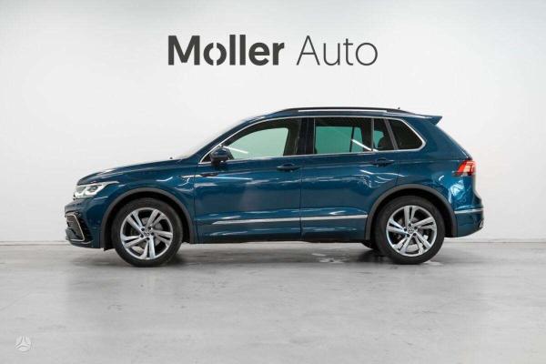 Blue Volkswagen Tiguan 2021 in Vilnius, with an engine capacity of 1.50 L and mileage of 99 thousand km for 25300 €, photo 2 on AUTOMOTO.COM.LV