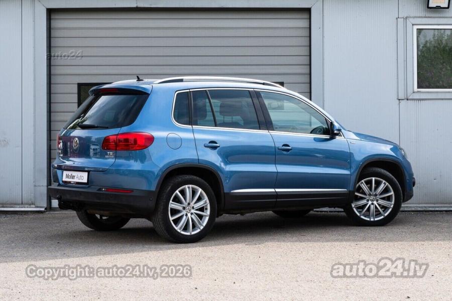 Blue Volkswagen Tiguan 2013 in Jelgava, with an engine capacity of 1.40 L and mileage of 168 thousand km for 10350 €, photo 4 on AUTOMOTO.COM.LV