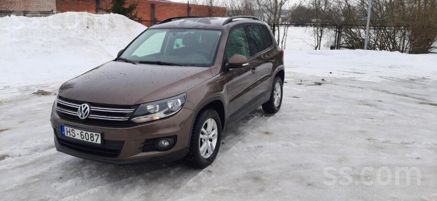 Brūns Volkswagen Tiguan 2011 Rīga, ar dzinēja tilpumu 2.00 L un nobraukumu 295 tūkst. km par 8300 €, foto 1 vietnē AUTOMOTO.COM.LV