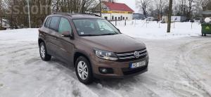 Brūns Volkswagen Tiguan 2011 Rīga, ar dzinēja tilpumu 2.00 L un nobraukumu 295 tūkst. km par 8300 €, foto 2 vietnē AUTOMOTO.COM.LV