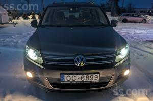 Brown Volkswagen Tiguan 2011 in Riga, with an engine capacity of 2.00 L and mileage of 215 thousand km for 11999 €, photo 22 on AUTOMOTO.COM.LV