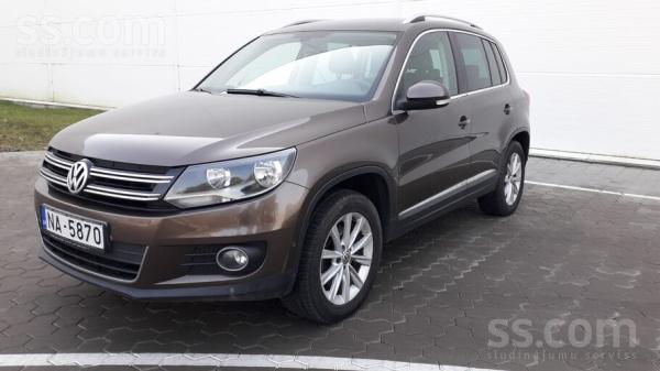 Brūns Volkswagen Tiguan 2011 Rīga, ar dzinēja tilpumu 2.00 L un nobraukumu 286 tūkst. km par 8999 €, foto 1 vietnē AUTOMOTO.COM.LV