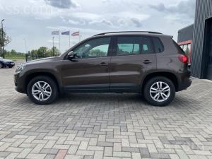 Brown Volkswagen Tiguan 2011 in Ogre, with an engine capacity of 2.00 L and mileage of 305 thousand km for 5470 €, photo 3 on AUTOMOTO.COM.LV
