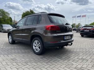 Brown Volkswagen Tiguan 2011 in Ogre, with an engine capacity of 2.00 L and mileage of 305 thousand km for 5470 €, photo 4 on AUTOMOTO.COM.LV