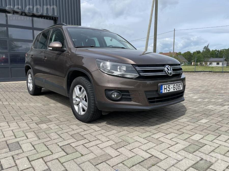 Brown Volkswagen Tiguan 2011 in Ogre, with an engine capacity of 2.00 L and mileage of 305 thousand km for 5470 €, photo 7 on AUTOMOTO.COM.LV