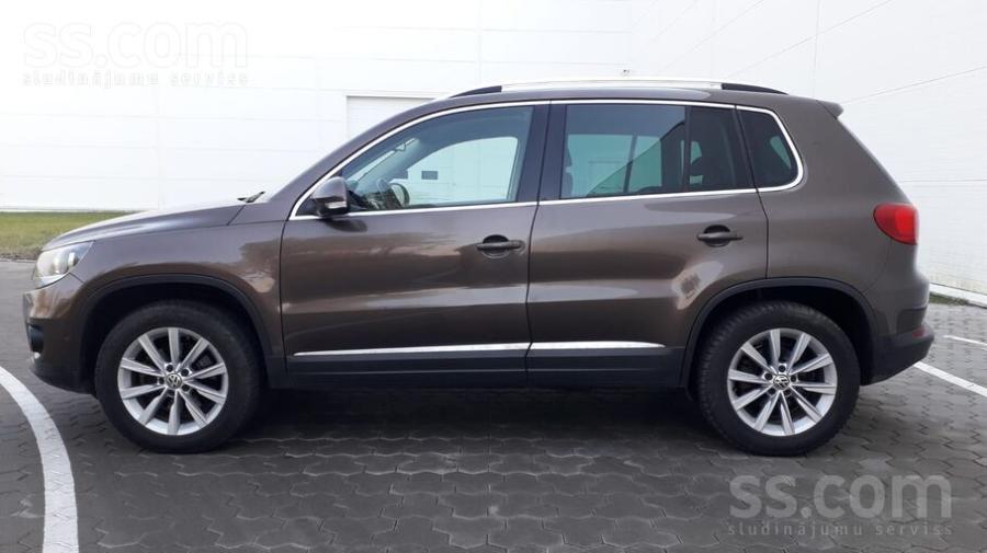 Brown Volkswagen Tiguan 2011 in Riga, with an engine capacity of 2.00 L and mileage of 294 thousand km for 8190 €, photo 4 on AUTOMOTO.COM.LV