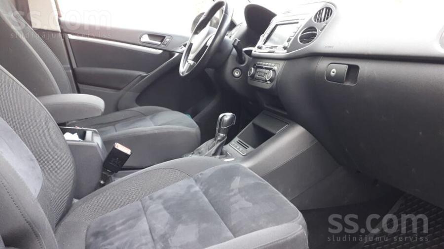 Brown Volkswagen Tiguan 2011 in Riga, with an engine capacity of 2.00 L and mileage of 294 thousand km for 8190 €, photo 13 on AUTOMOTO.COM.LV