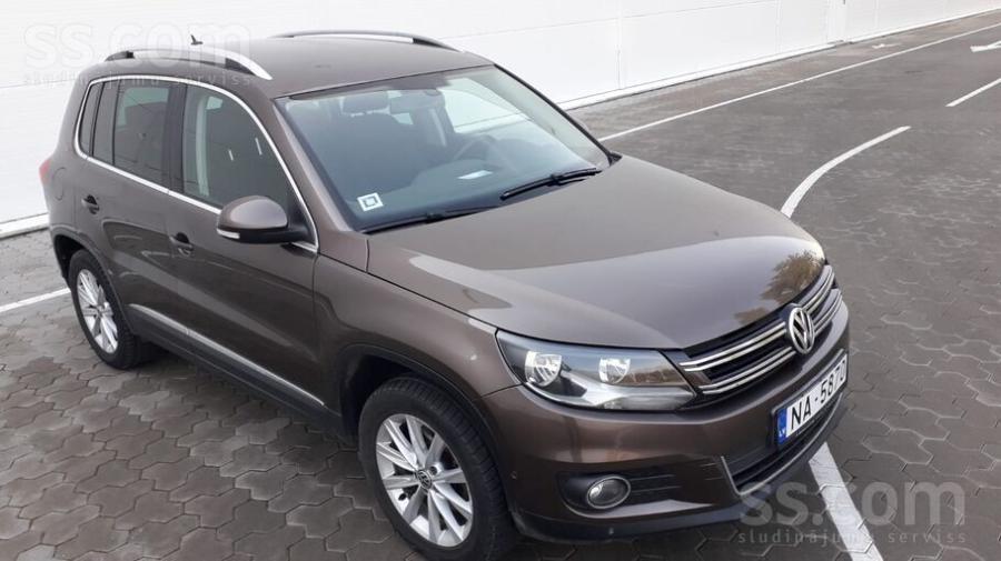 Brown Volkswagen Tiguan 2011 in Riga, with an engine capacity of 2.00 L and mileage of 294 thousand km for 8190 €, photo 16 on AUTOMOTO.COM.LV