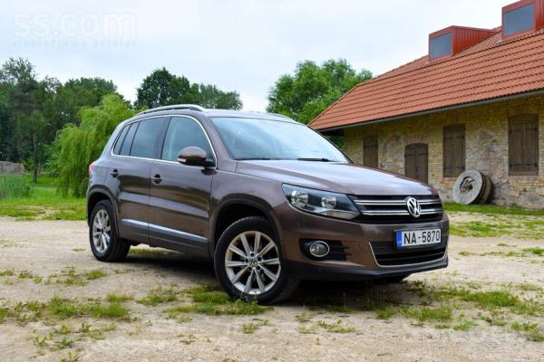 Brūns Volkswagen Tiguan 2011 Rīga, ar dzinēja tilpumu 2.00 L un nobraukumu 294 tūkst. km par 7790 €, foto 1 vietnē AUTOMOTO.COM.LV