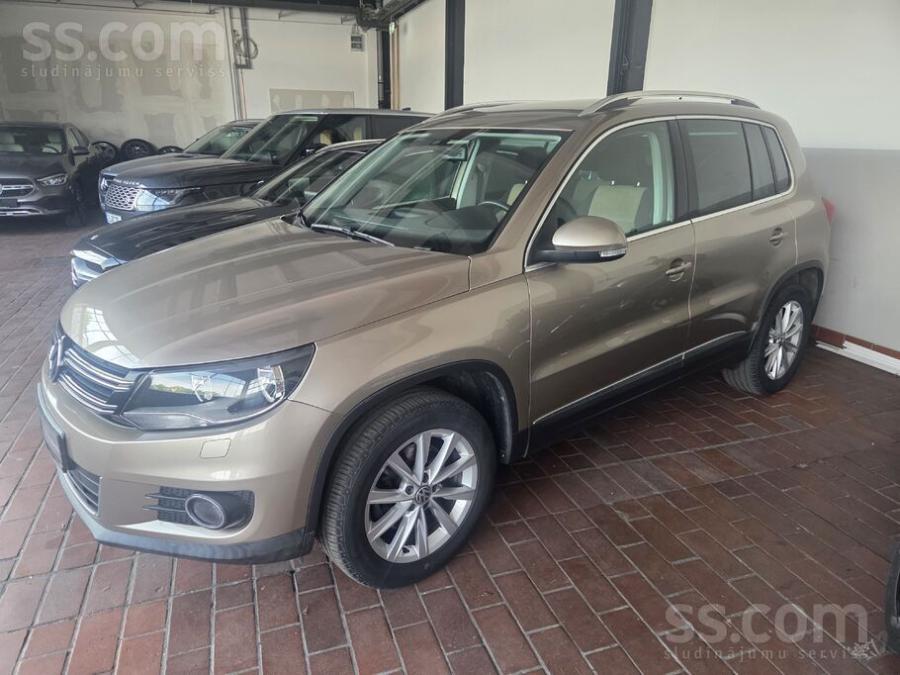 Brown Volkswagen Tiguan 2011 in Jekabpils, with an engine capacity of 2.00 L and mileage of 231 thousand km for 8600 €, photo 1 on AUTOMOTO.COM.LV