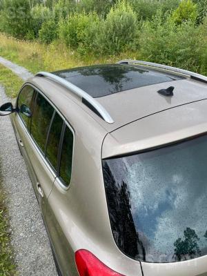 Brown Volkswagen Tiguan 2011 in Riga, with an engine capacity of 2.00 L and mileage of 339 thousand km for 8300 €, photo 8 on AUTOMOTO.COM.LV