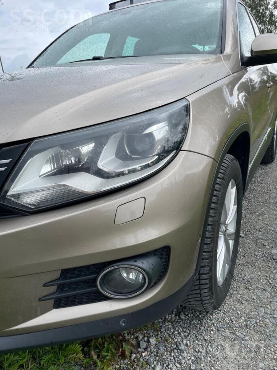 Brown Volkswagen Tiguan 2011 in Riga, with an engine capacity of 2.00 L and mileage of 339 thousand km for 8300 €, photo 10 on AUTOMOTO.COM.LV