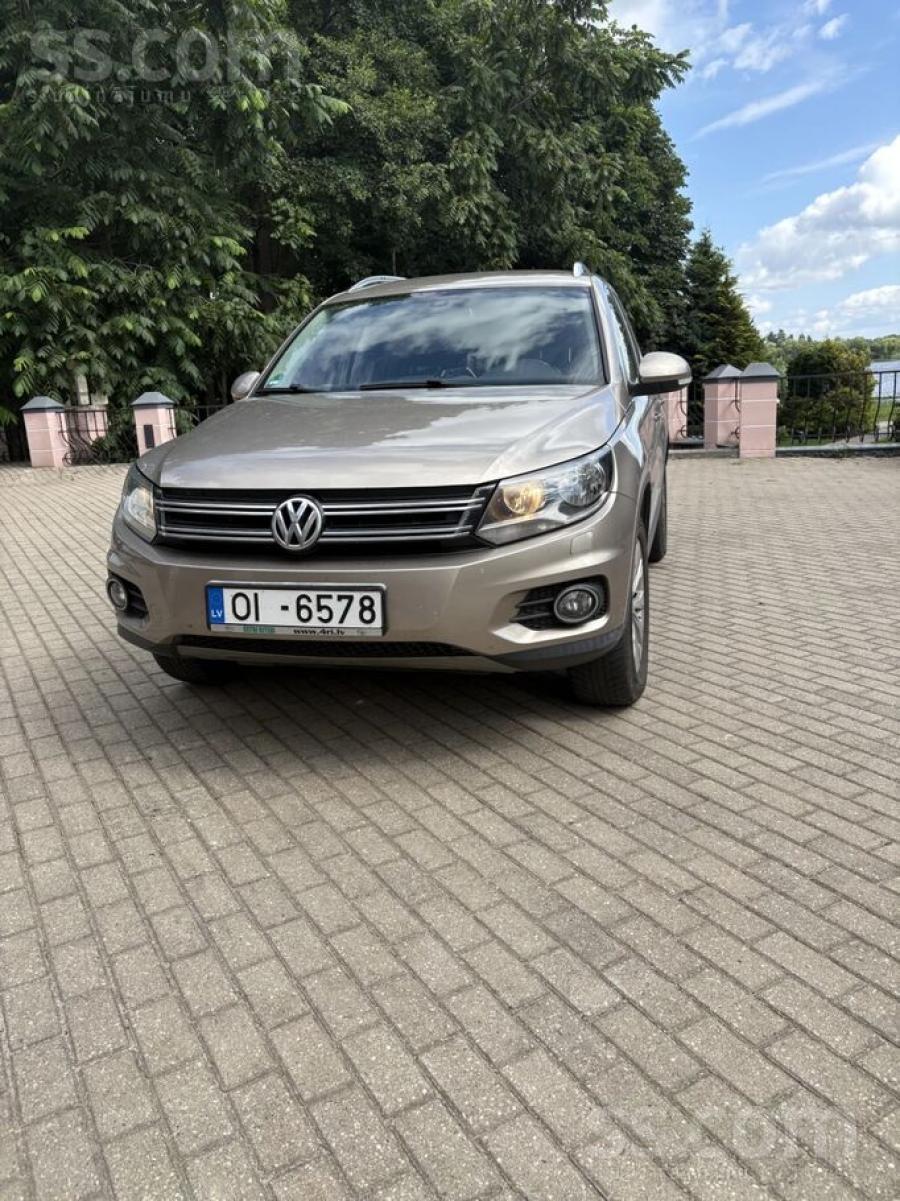 Brūns Volkswagen Tiguan 2011 Rīga, ar dzinēja tilpumu 2.00 L un nobraukumu 271 tūkst. km par 9300 €, foto 1 vietnē AUTOMOTO.COM.LV