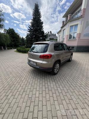 Brūns Volkswagen Tiguan 2011 Rīga, ar dzinēja tilpumu 2.00 L un nobraukumu 271 tūkst. km par 9300 €, foto 4 vietnē AUTOMOTO.COM.LV
