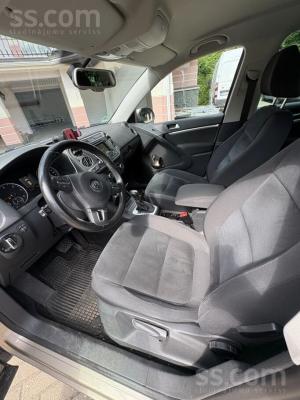 Brūns Volkswagen Tiguan 2011 Rīga, ar dzinēja tilpumu 2.00 L un nobraukumu 271 tūkst. km par 9300 €, foto 12 vietnē AUTOMOTO.COM.LV