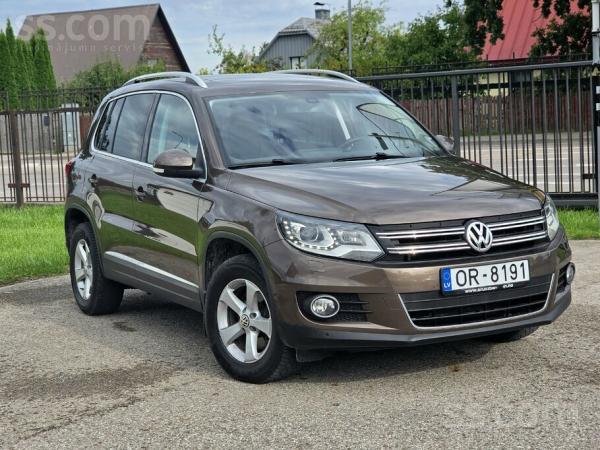 Brūns Volkswagen Tiguan 2011 Jelgava, ar dzinēja tilpumu 2.00 L un nobraukumu 242 tūkst. km par 9990 €, foto 4 vietnē AUTOMOTO.COM.LV