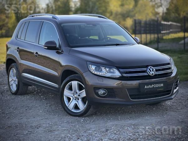 Brown Volkswagen Tiguan 2012 in Riga, with an engine capacity of 2.00 L and mileage of 162 thousand km for 9990 €, photo 9 on AUTOMOTO.COM.LV