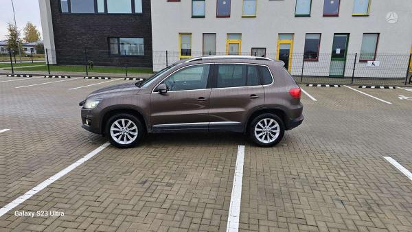 Brown Volkswagen Tiguan 2012 in Kaunas, with an engine capacity of 1.97 L and mileage of 330 thousand km for 8200 €, photo 11 on AUTOMOTO.COM.LV