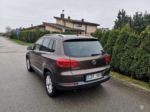 Brown Volkswagen Tiguan 2012 in Klaipeda, with an engine capacity of 1.40 L and mileage of 180 thousand km for 4999 €, photo 6 on AUTOMOTO.COM.LV