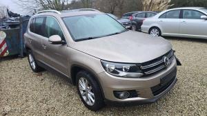 Brown Volkswagen Tiguan 2012 in Siauliai, with an engine capacity of 1.97 L and mileage of 260 thousand km for 5300 €, photo  on AUTOMOTO.COM.LV