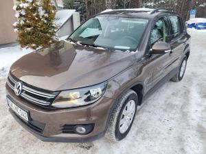 Brown Volkswagen Tiguan 2012 in Utena, with an engine capacity of 1.39 L and mileage of 125 thousand km for 7500 €, photo  on AUTOMOTO.COM.LV