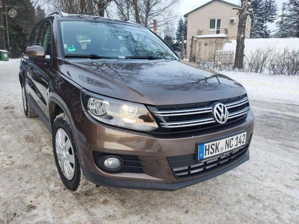 Brown Volkswagen Tiguan 2012 in Utena, with an engine capacity of 1.39 L and mileage of 125 thousand km for 7500 €, photo 6 on AUTOMOTO.COM.LV