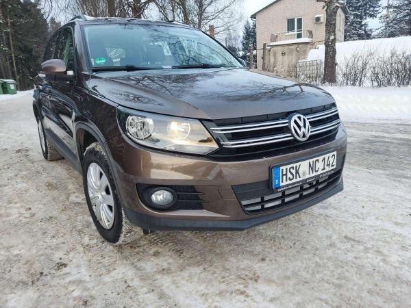Brown Volkswagen Tiguan 2012 in Utena, with an engine capacity of 1.39 L and mileage of 125 thousand km for 7500 €, photo 10 on AUTOMOTO.COM.LV