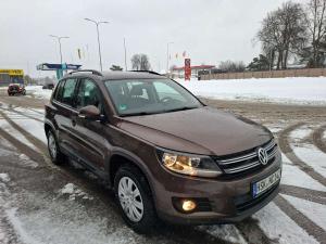 Brown Volkswagen Tiguan 2012 in Utena, with an engine capacity of 1.39 L and mileage of 124 thousand km for 6999 €, photo  on AUTOMOTO.COM.LV