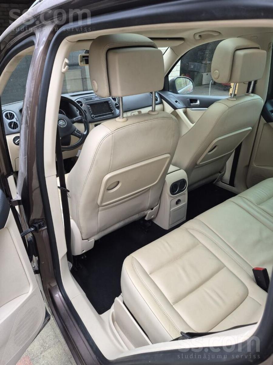 Brown Volkswagen Tiguan 2012 in Jelgava, with an engine capacity of 2.00 L and mileage of 324 thousand km for 6490 €, photo 12 on AUTOMOTO.COM.LV