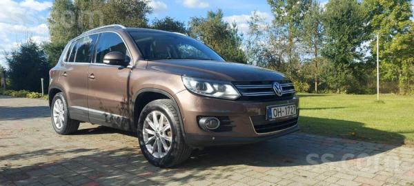 Brūns Volkswagen Tiguan 2012 Jelgava, ar dzinēja tilpumu 2.00 L un nobraukumu 324 tūkst. km par 6490 €, foto 1 vietnē AUTOMOTO.COM.LV