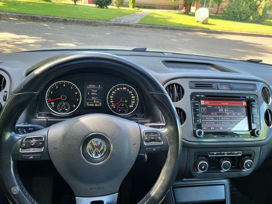 Brown Volkswagen Tiguan 2012 in Siauliai, with an engine capacity of 1.98 L and mileage of 150 thousand km for 5450 €, photo 16 on AUTOMOTO.COM.LV
