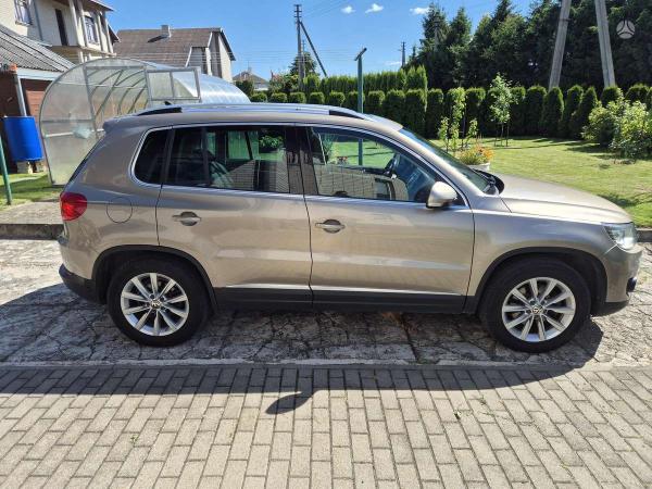 Brown Volkswagen Tiguan 2012 in Marijampole, with an engine capacity of 1.97 L and mileage of 162 thousand km for 8700 €, photo 2 on AUTOMOTO.COM.LV