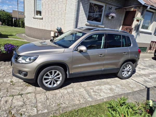 Brown Volkswagen Tiguan 2012 in Marijampole, with an engine capacity of 1.97 L and mileage of 162 thousand km for 8700 €, photo 4 on AUTOMOTO.COM.LV