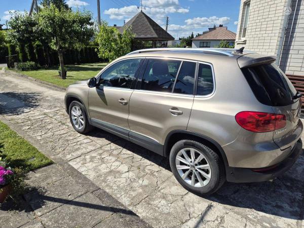 Brown Volkswagen Tiguan 2012 in Marijampole, with an engine capacity of 1.97 L and mileage of 162 thousand km for 8700 €, photo 5 on AUTOMOTO.COM.LV