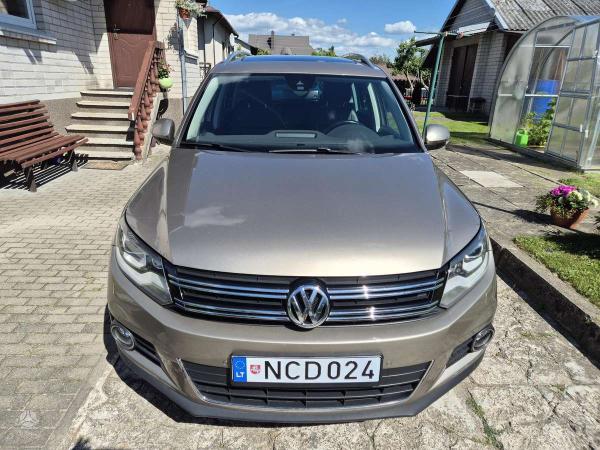 Brown Volkswagen Tiguan 2012 in Marijampole, with an engine capacity of 1.97 L and mileage of 162 thousand km for 8700 €, photo 6 on AUTOMOTO.COM.LV