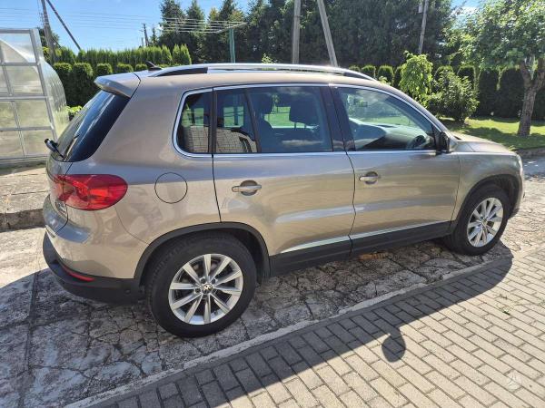 Brown Volkswagen Tiguan 2012 in Marijampole, with an engine capacity of 1.97 L and mileage of 162 thousand km for 8700 €, photo 8 on AUTOMOTO.COM.LV