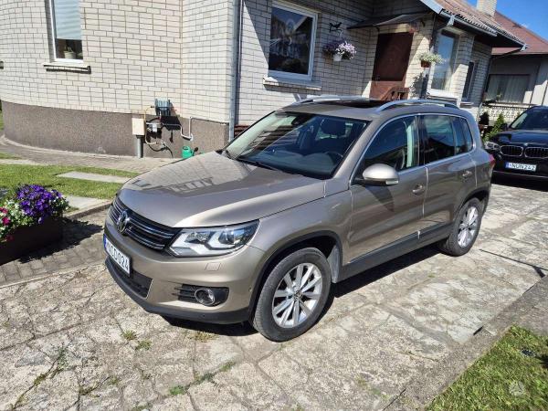 Brown Volkswagen Tiguan 2012 in Marijampole, with an engine capacity of 1.97 L and mileage of 162 thousand km for 8700 €, photo 9 on AUTOMOTO.COM.LV