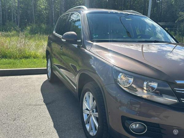 Brown Volkswagen Tiguan 2012 in Utena, with an engine capacity of 1.98 L and mileage of 183 thousand km for 8650 €, photo 5 on AUTOMOTO.COM.LV