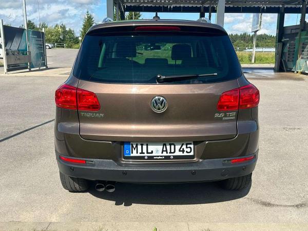 Brown Volkswagen Tiguan 2012 in Utena, with an engine capacity of 1.98 L and mileage of 183 thousand km for 8650 €, photo 9 on AUTOMOTO.COM.LV
