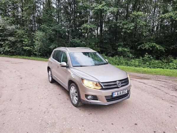 Brown Volkswagen Tiguan 2012 in Kaunas, with an engine capacity of 1.39 L and mileage of 187 thousand km for 4900 €, photo 2 on AUTOMOTO.COM.LV